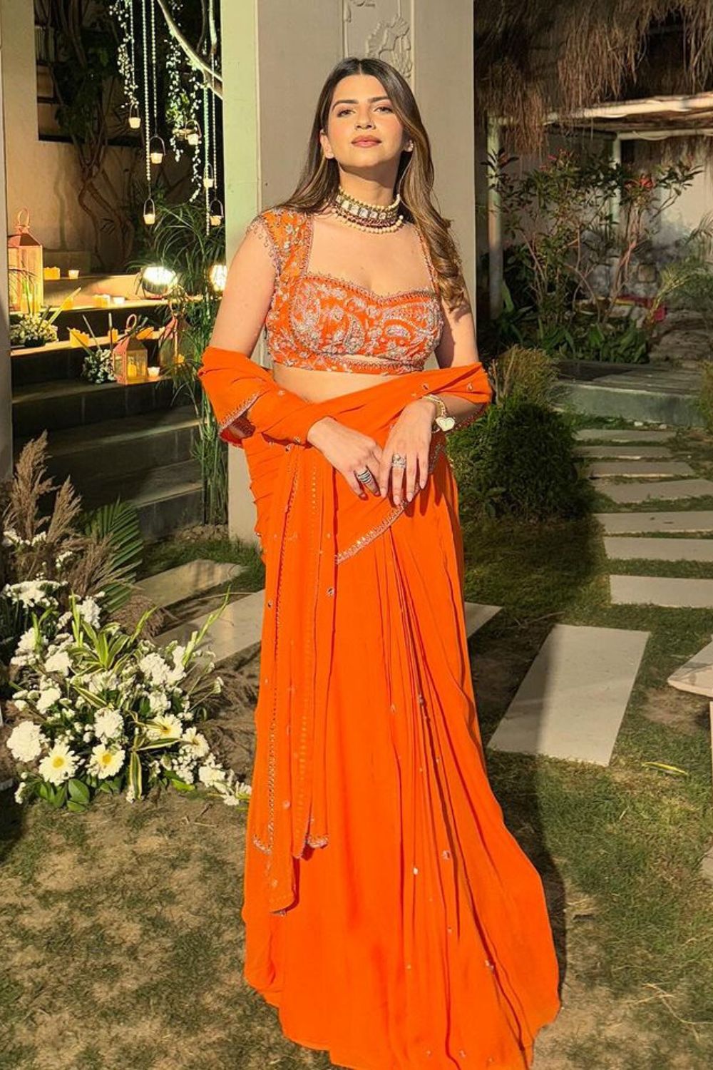 Dhriti Mehra In Our Orange Pre-Draped Saree – Sanya Gulati